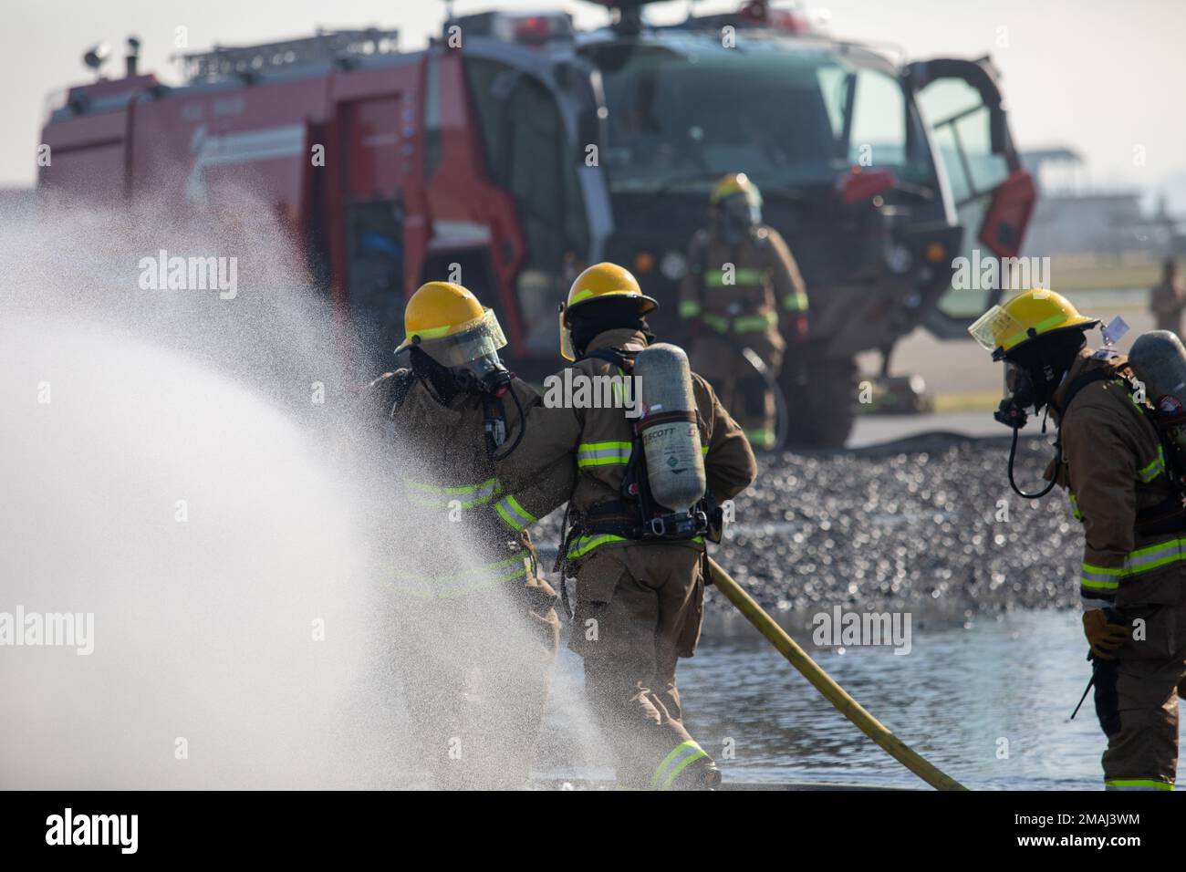 U.S. Marines with Aircraft Rescue and Firefighting of Headquarters and ...