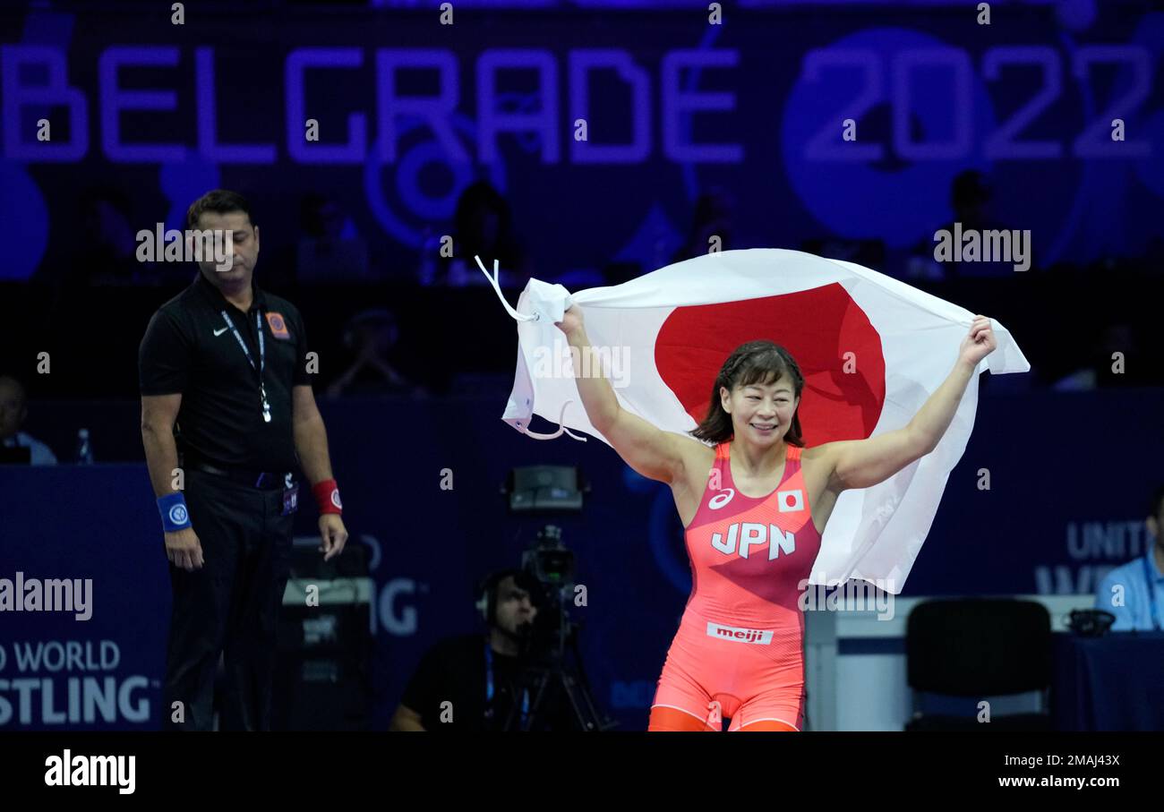 Japan's Mayu Shidochi Mukaida celebrates after the women's freestyle 55 ...