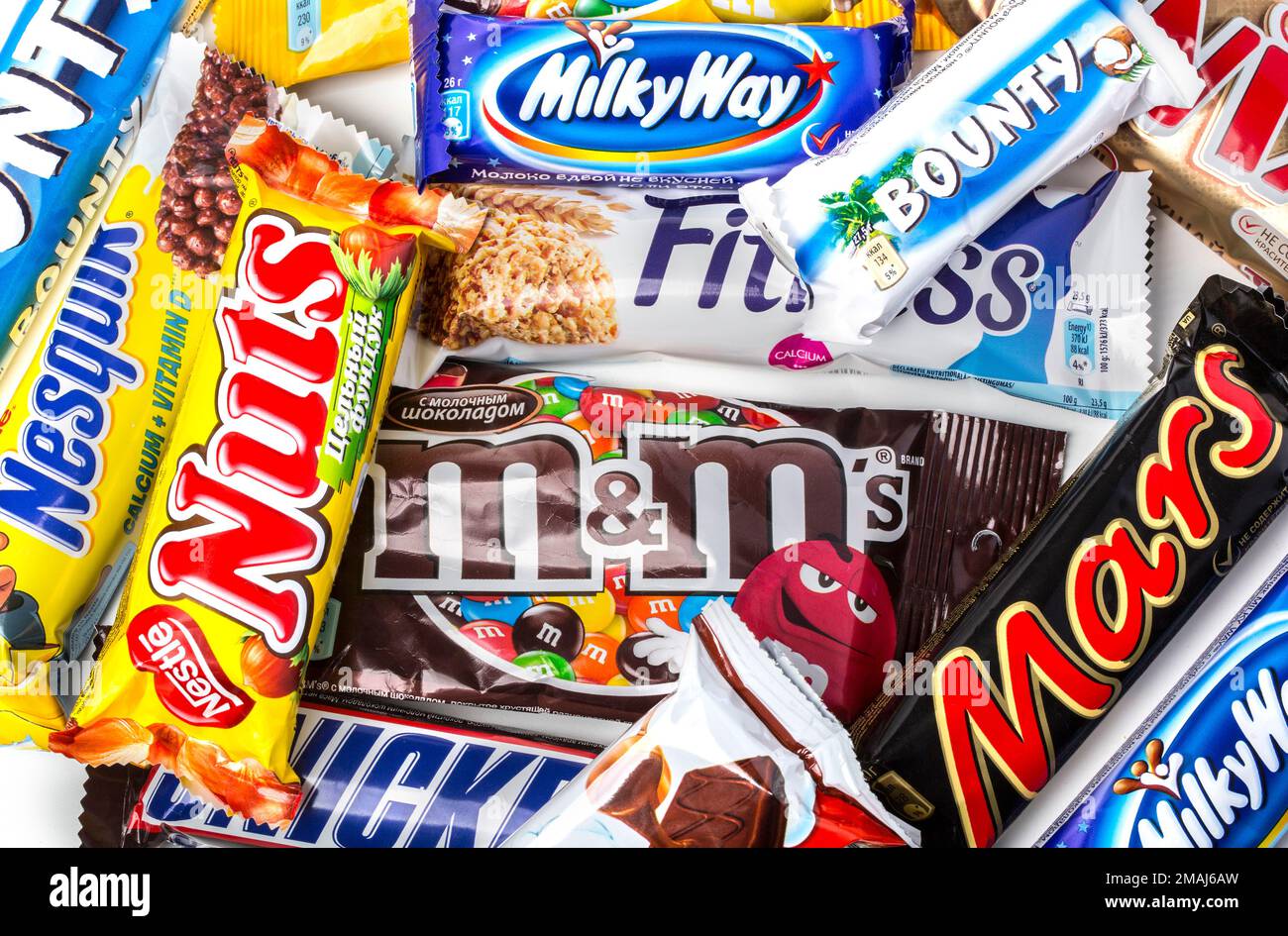 CHISINAU, MOLDOVA - November 12, 2015: A pile of various chocolate bars ...