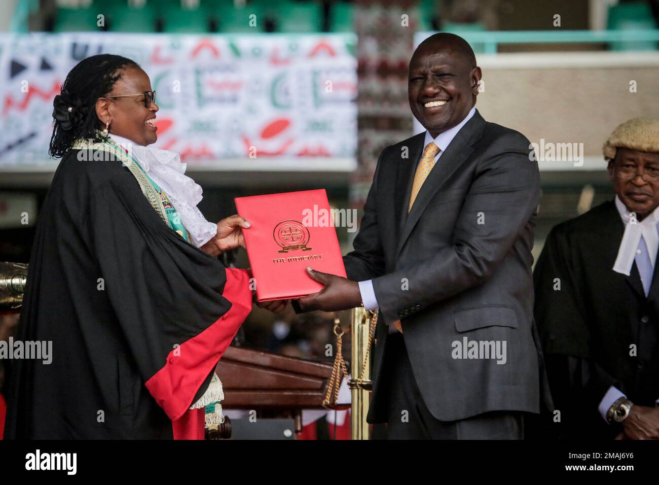 Kenya's new president William Ruto, right, accompanied by Kenya's Supreme Court Chief Justice ...