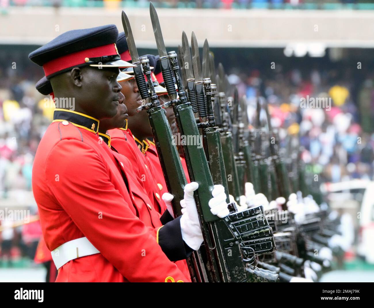 Soldiers stand guard as outgoing President Uhuru Kenyatta inspects his ...