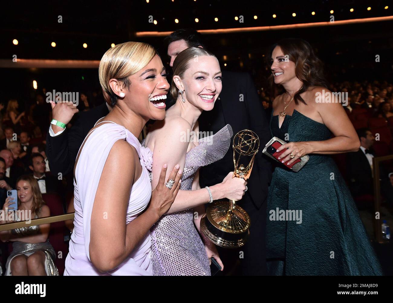Ariana DeBose, left, and Amanda Seyfried, winner of lead actress in a ...