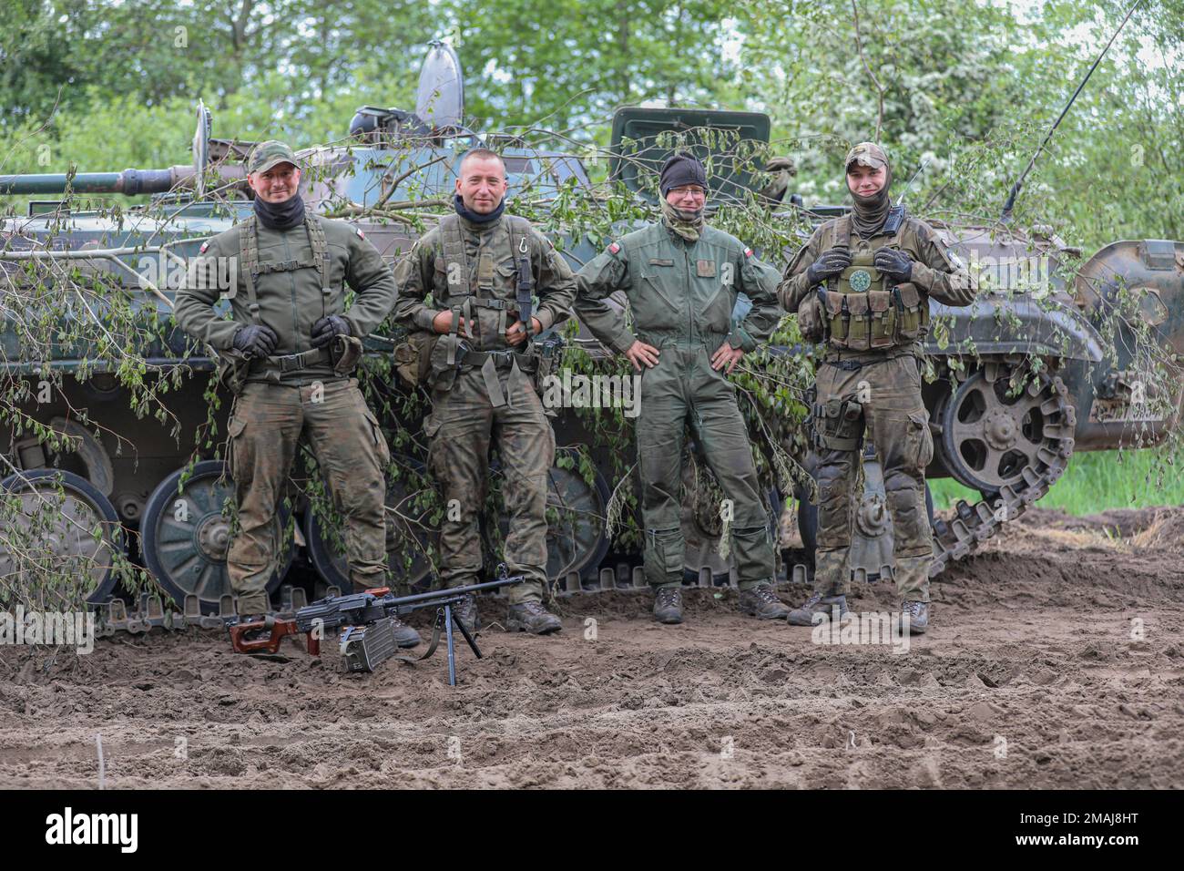 Polish soldiers pose for a photo before a live-fire training exercise ...