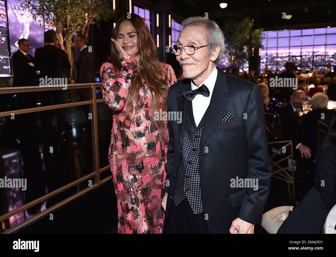 Chrissy Teigen, left, and O Yeong-su at the 74th Emmy Awards on Monday ...
