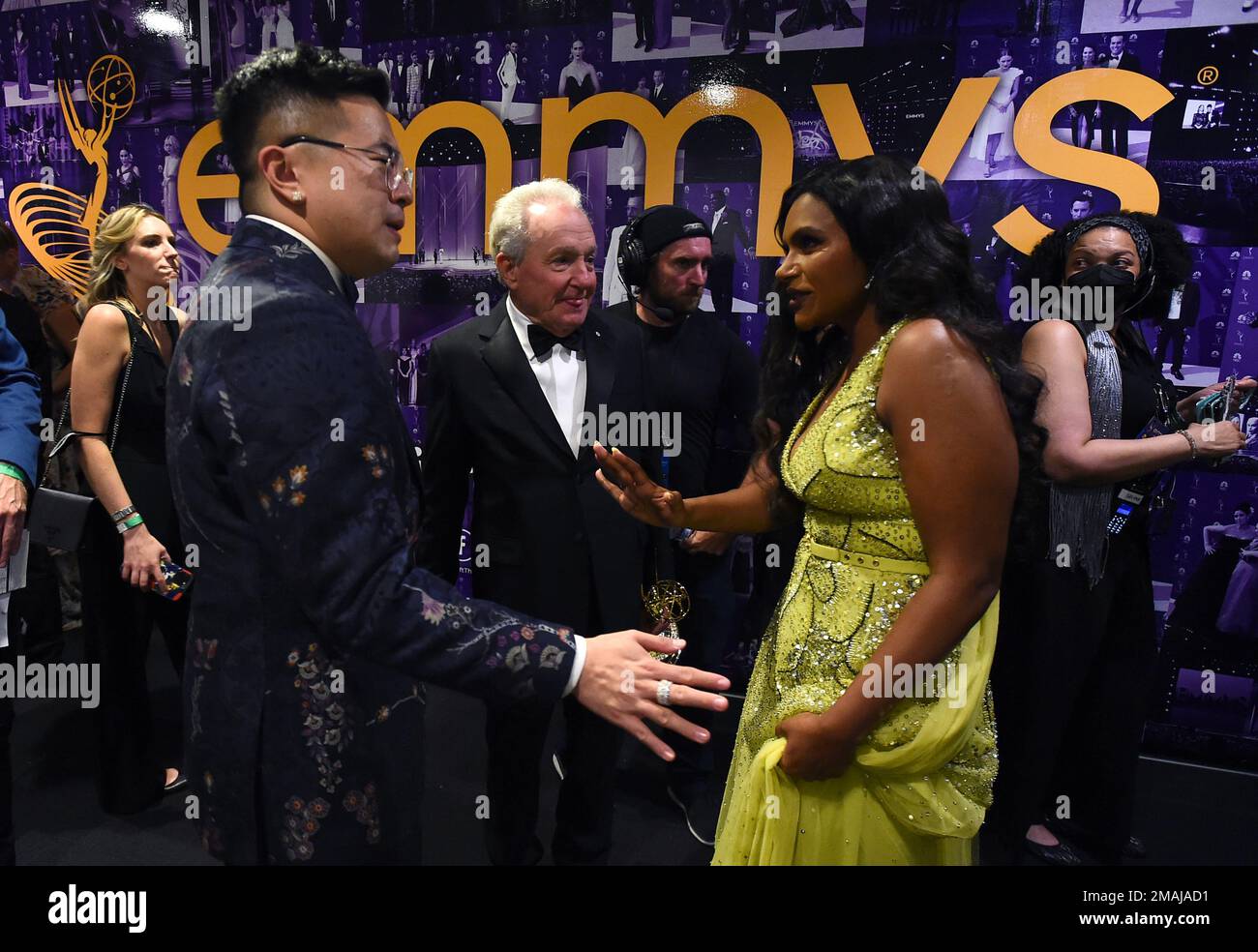 Bowen Yang, from left, Lorne Michaels, and Mindy Kaling at the 74th ...