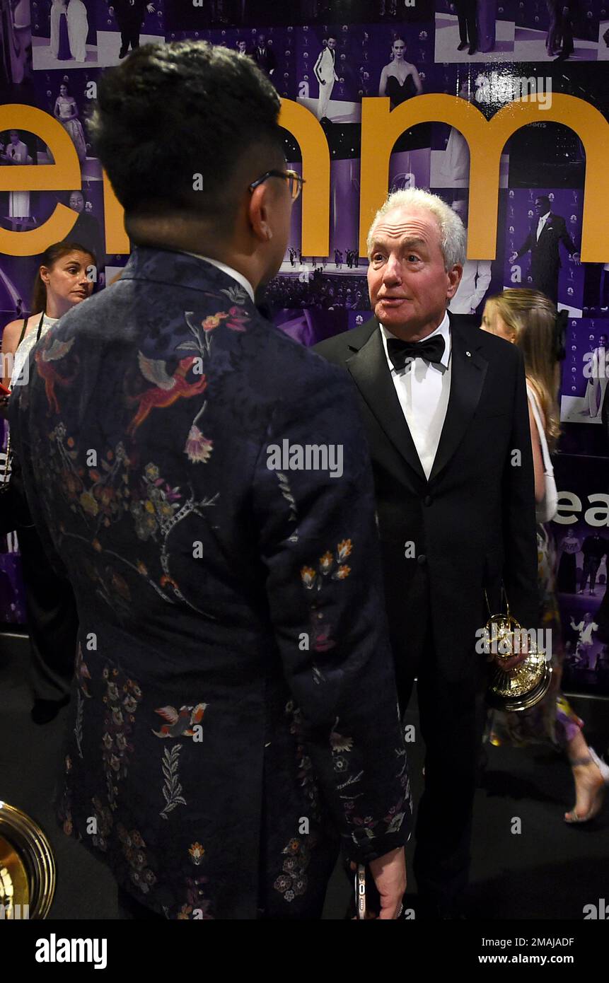 Bowen Yang, left, and Lorne Michaels at the 74th Emmy Awards on Monday ...
