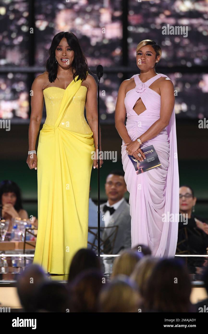 Angela Bassett, left, and Ariana DeBose present the Emmy for ...