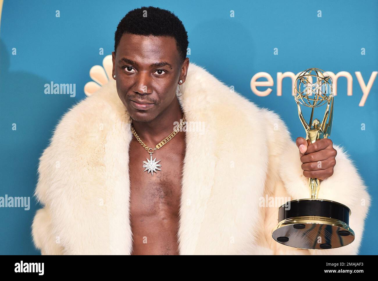Jerrod Carmichael poses with the Emmy for outstanding writing for a ...
