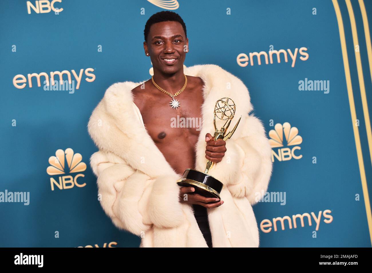 Jerrod Carmichael poses with the Emmy for outstanding writing for a ...