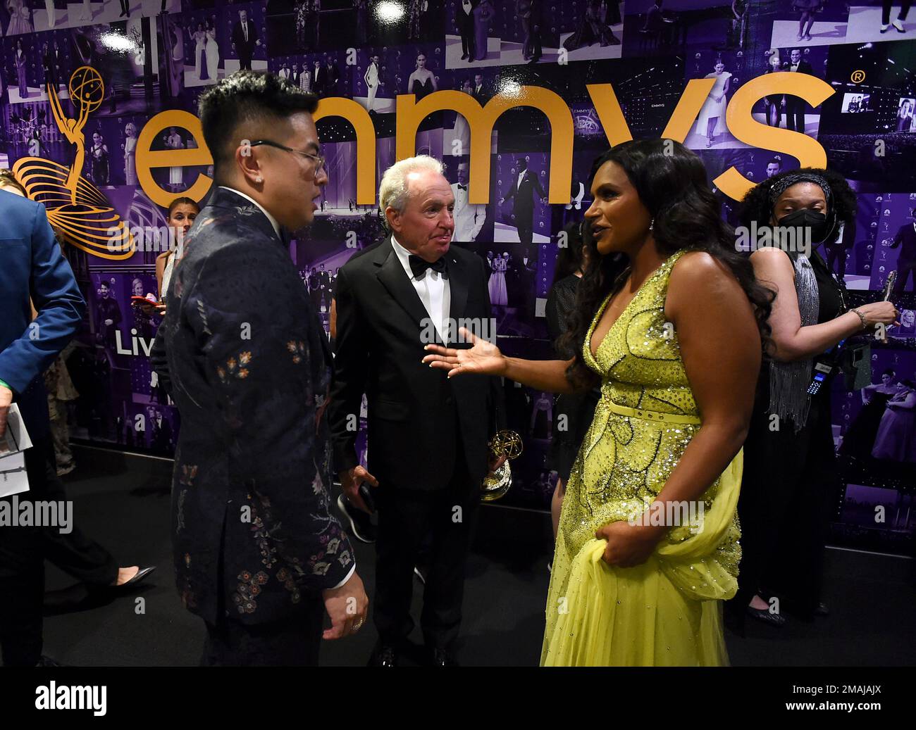 Bowen Yang, from left, Lorne Michaels, and Mindy Kaling at the 74th ...