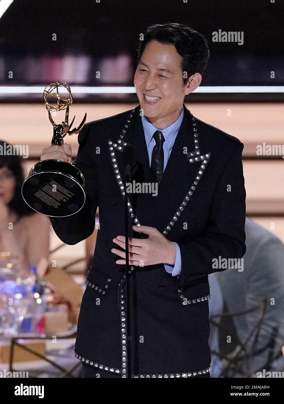 Lee Jung-jae accepts the Emmy for outstanding lead actor in a drama ...