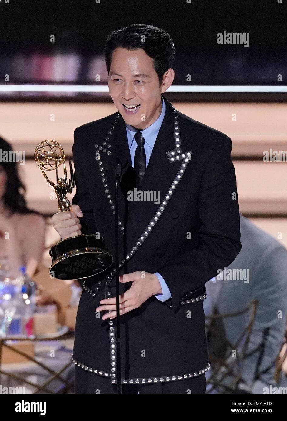 Lee Jung-jae accepts the Emmy for outstanding lead actor in a drama ...