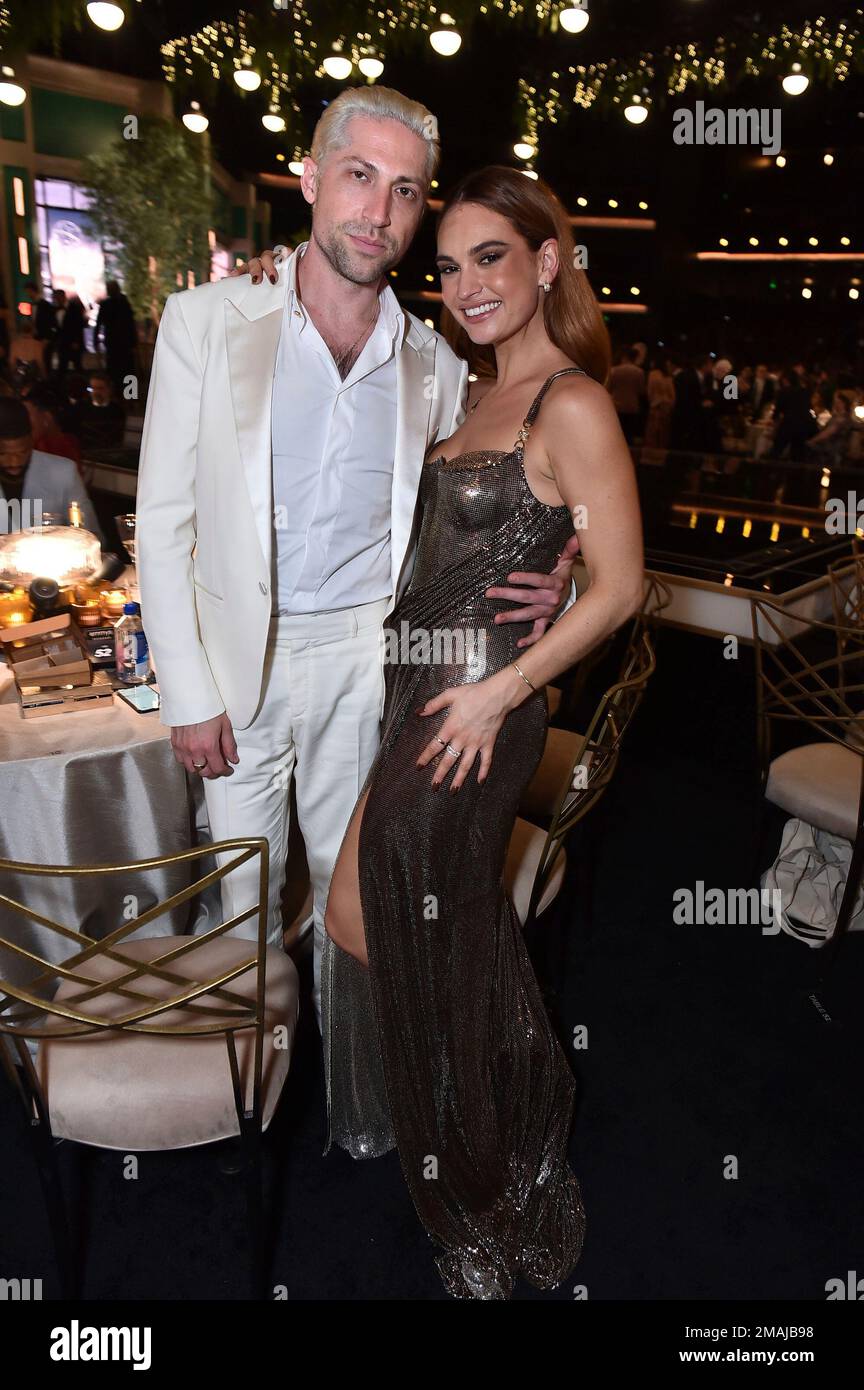 Michael Shuman, left, and Lily James at the 74th Emmy Awards on Monday ...