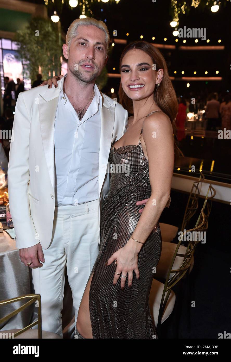 Michael Shuman, left, and Lily James at the 74th Emmy Awards on Monday ...