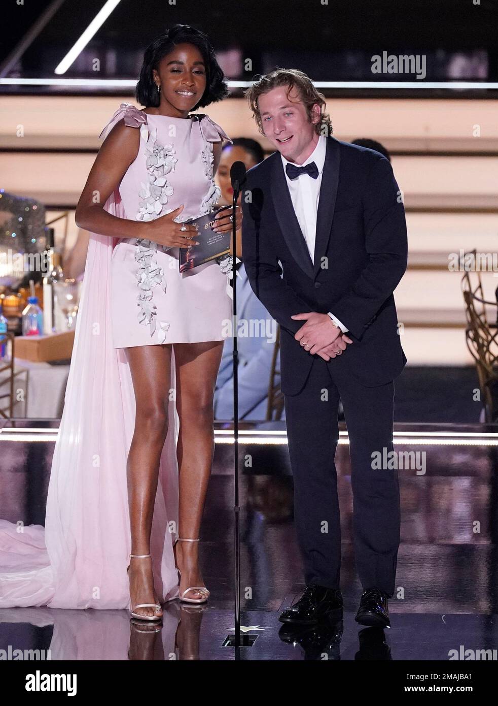 Ayo Edebiri, left, and Jeremy Allen White present the Emmy for ...