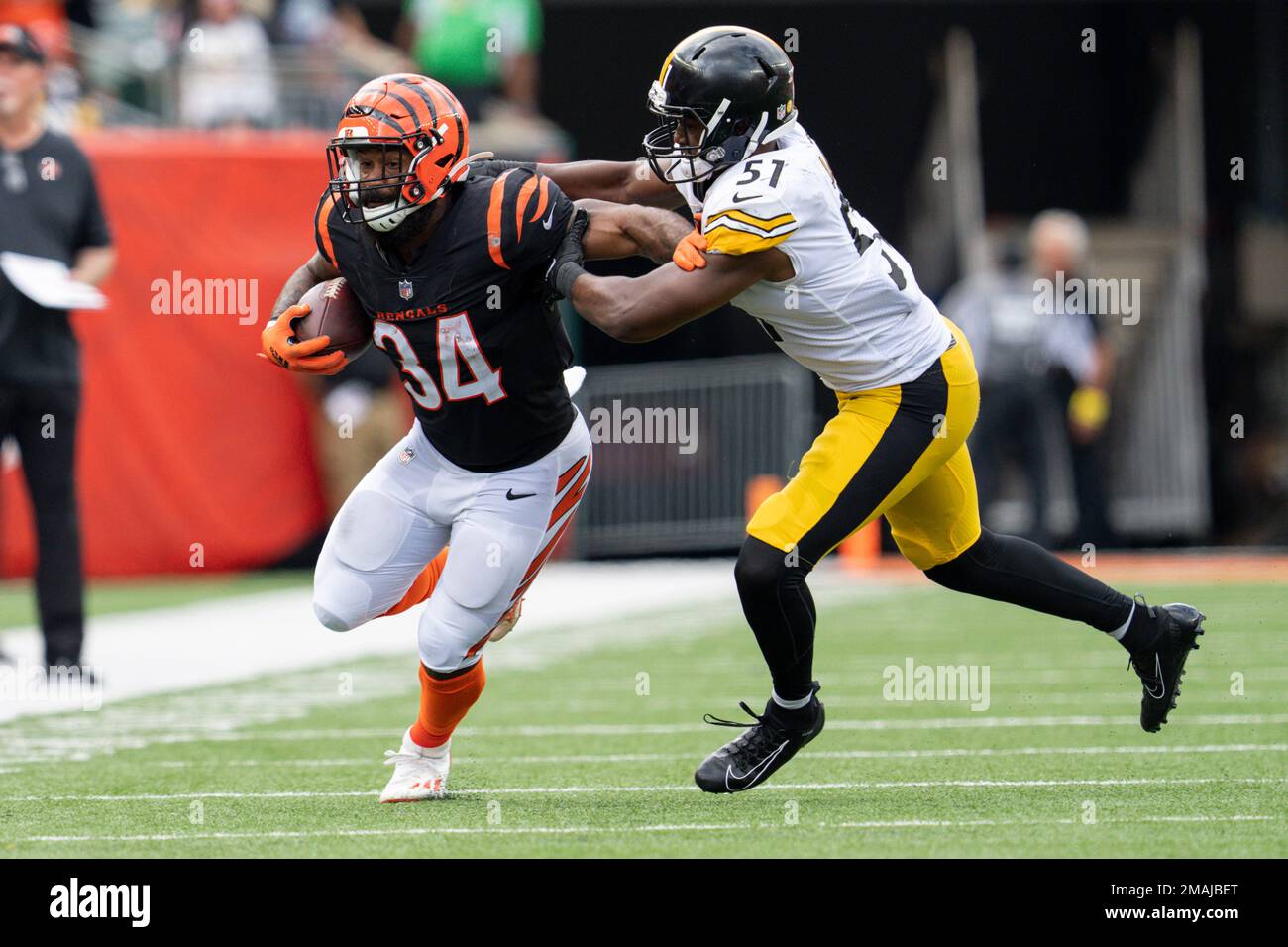 Cincinnati Bengals running back Samaje Perine (34) is tackled by ...