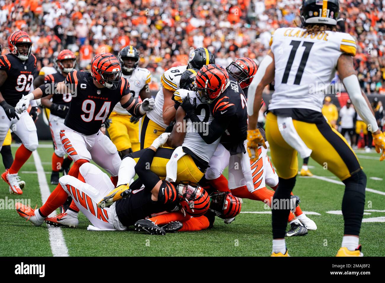 Pittsburgh Steelers running back Najee Harris, center, is tackled by ...