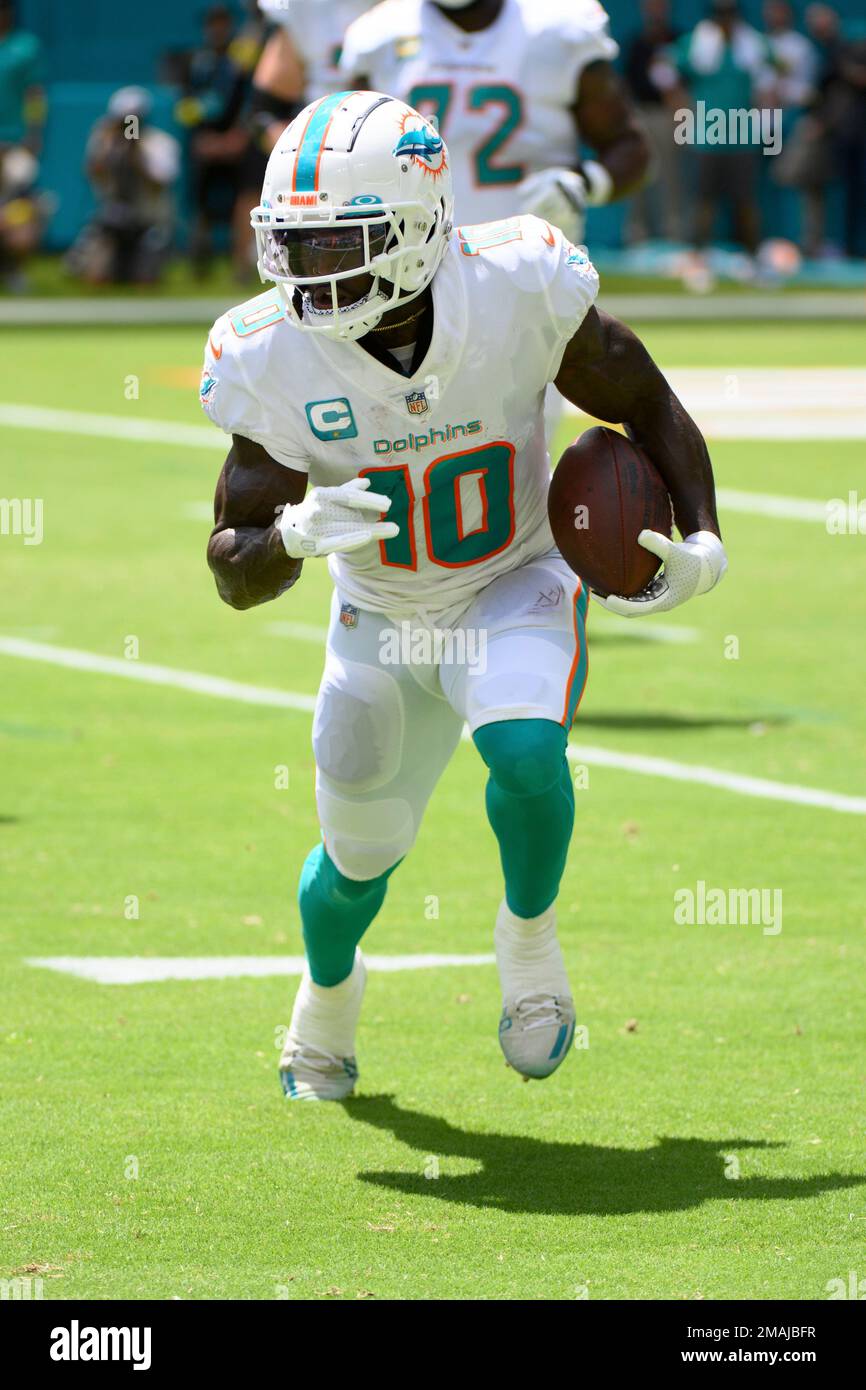 Miami Dolphins wide receiver Tyreek Hill (10) runs with the ball during ...