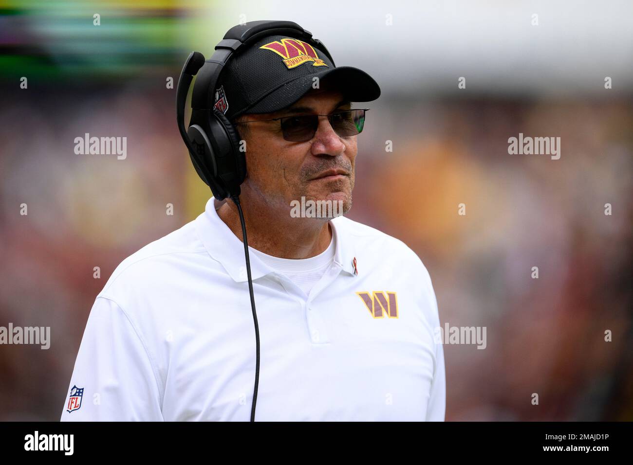 Washington Commanders head coach Ron Rivera looks on during the first ...