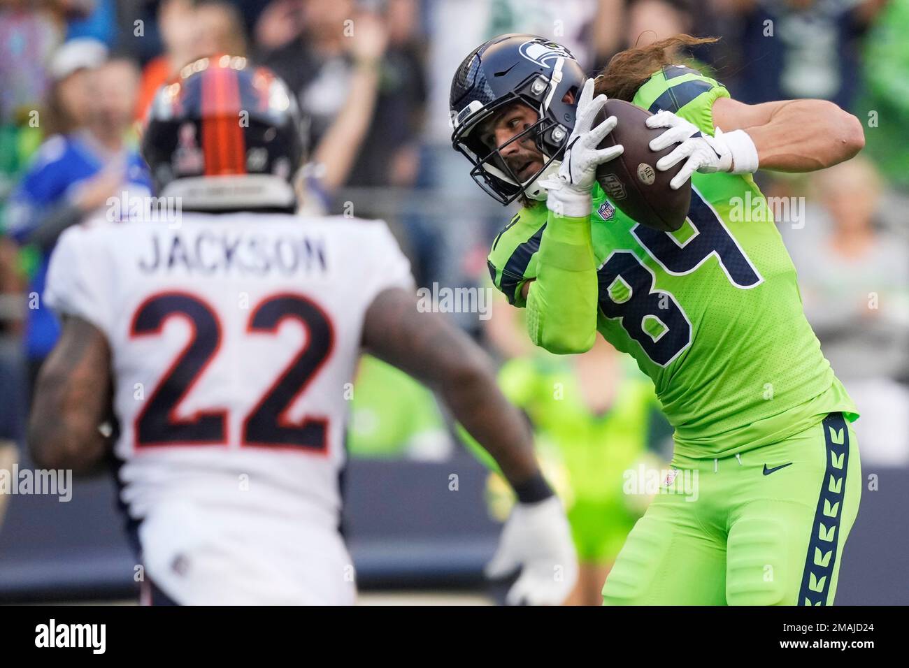 Seattle Seahawks tight end Colby Parkinson, right, catches a pass for a ...