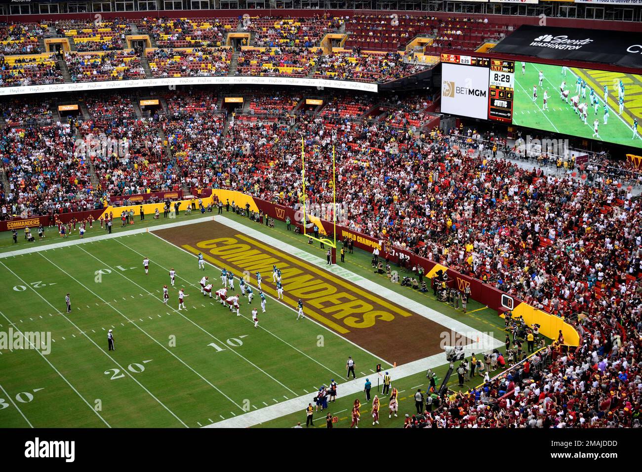 The Washington Commanders logo is seen in the end zone during a NFL ...