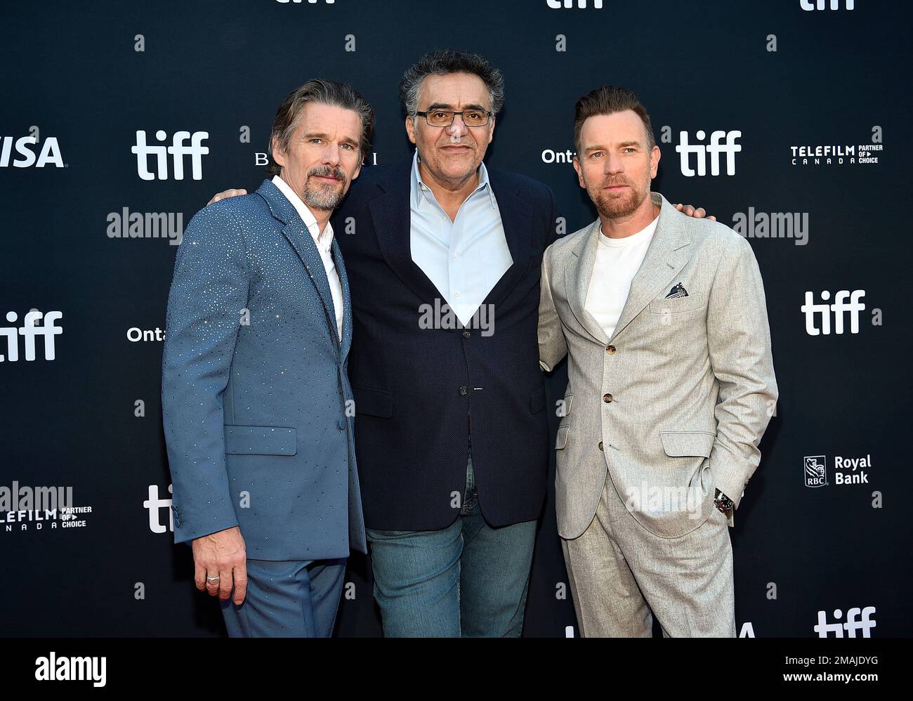 Ethan Hawke, left, Rodrigo Garcia and Ewan McGregor attend the premiere ...