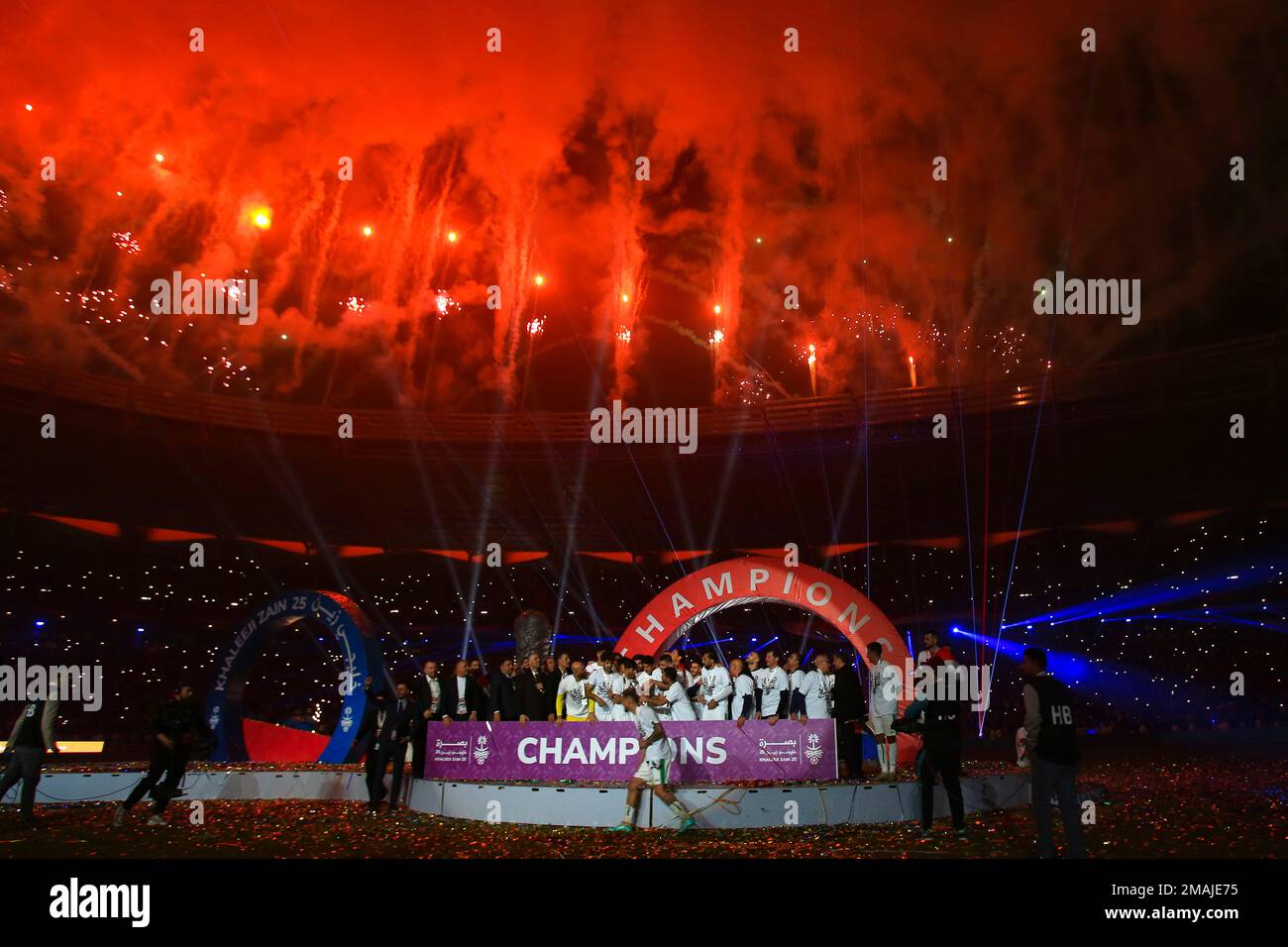 Iraq's national football team players celebrate with the trophy on the ...