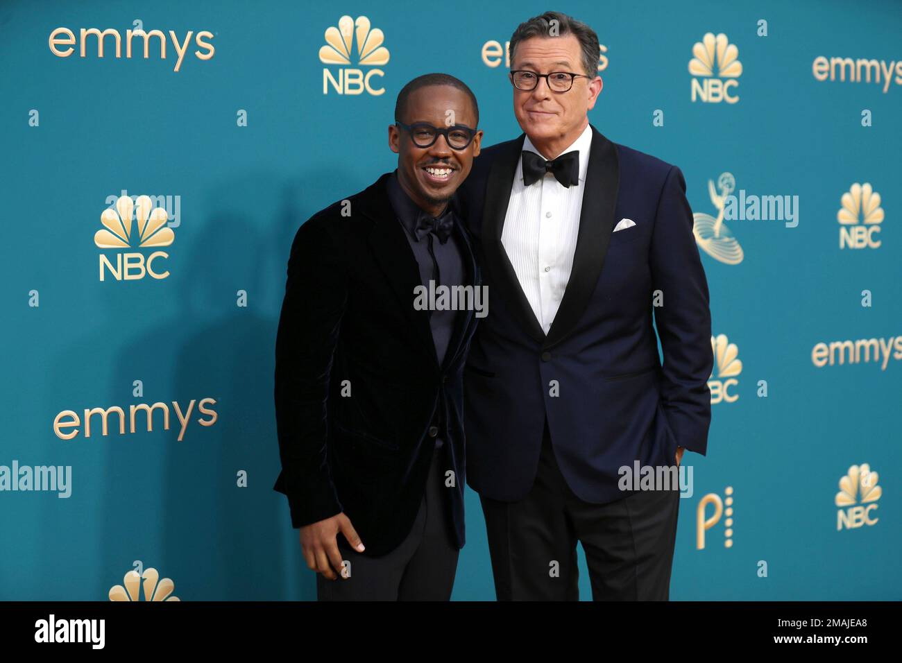 Louis Cato, left, and Stephen Colbert arrives at the 74th Emmy Awards ...