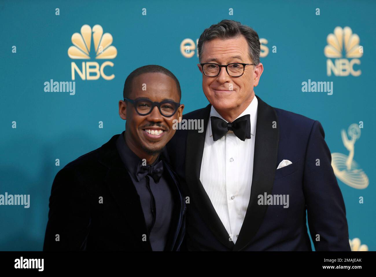 Louis Cato, left, and Stephen Colbert arrives at the 74th Emmy Awards ...