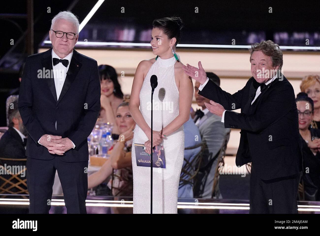 Steve Martin, from left, Selena Gomez, and Martin Short present the ...