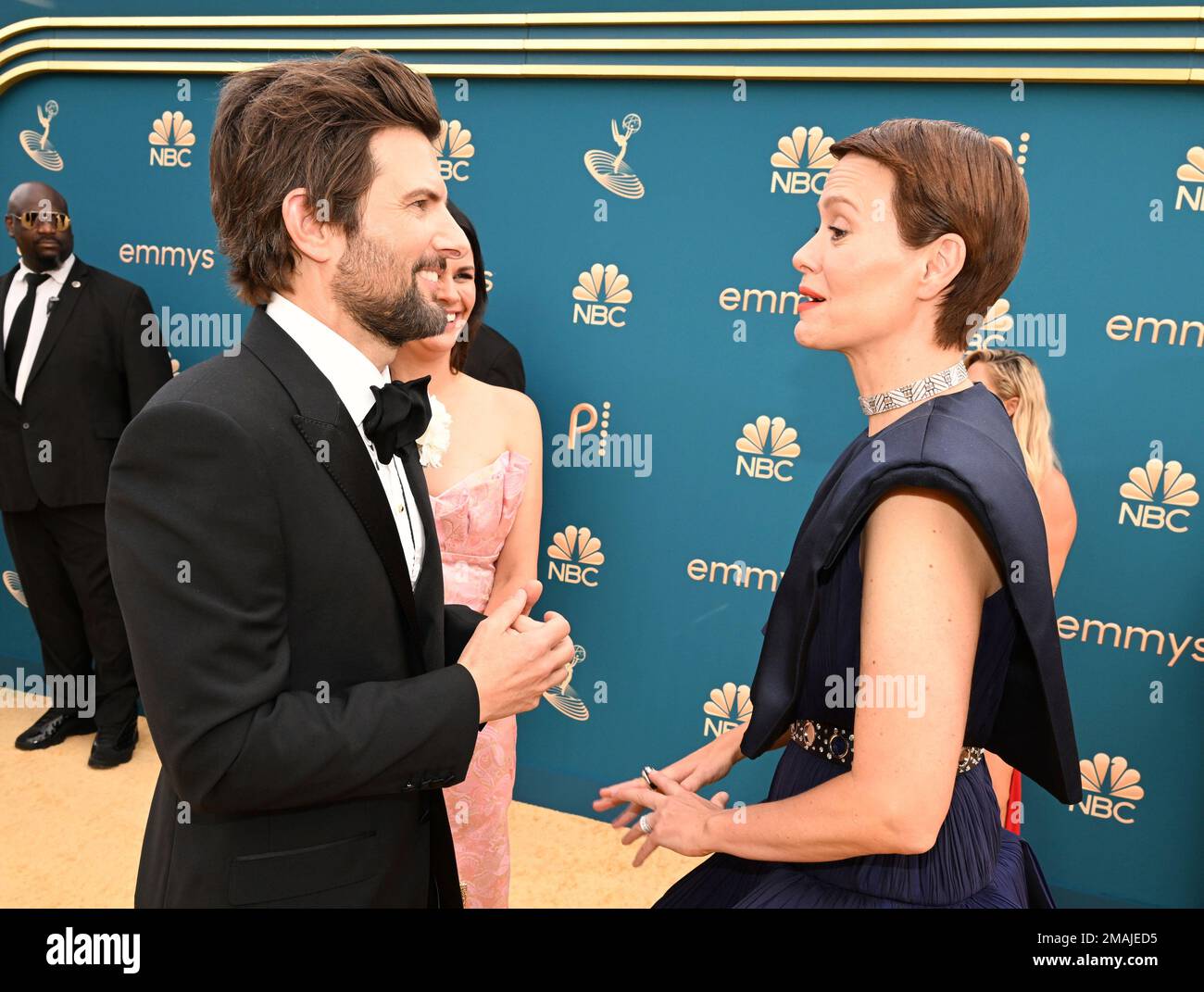 Adam Scott, left, and Sarah Paulson arrives at the 74th Emmy Awards on ...