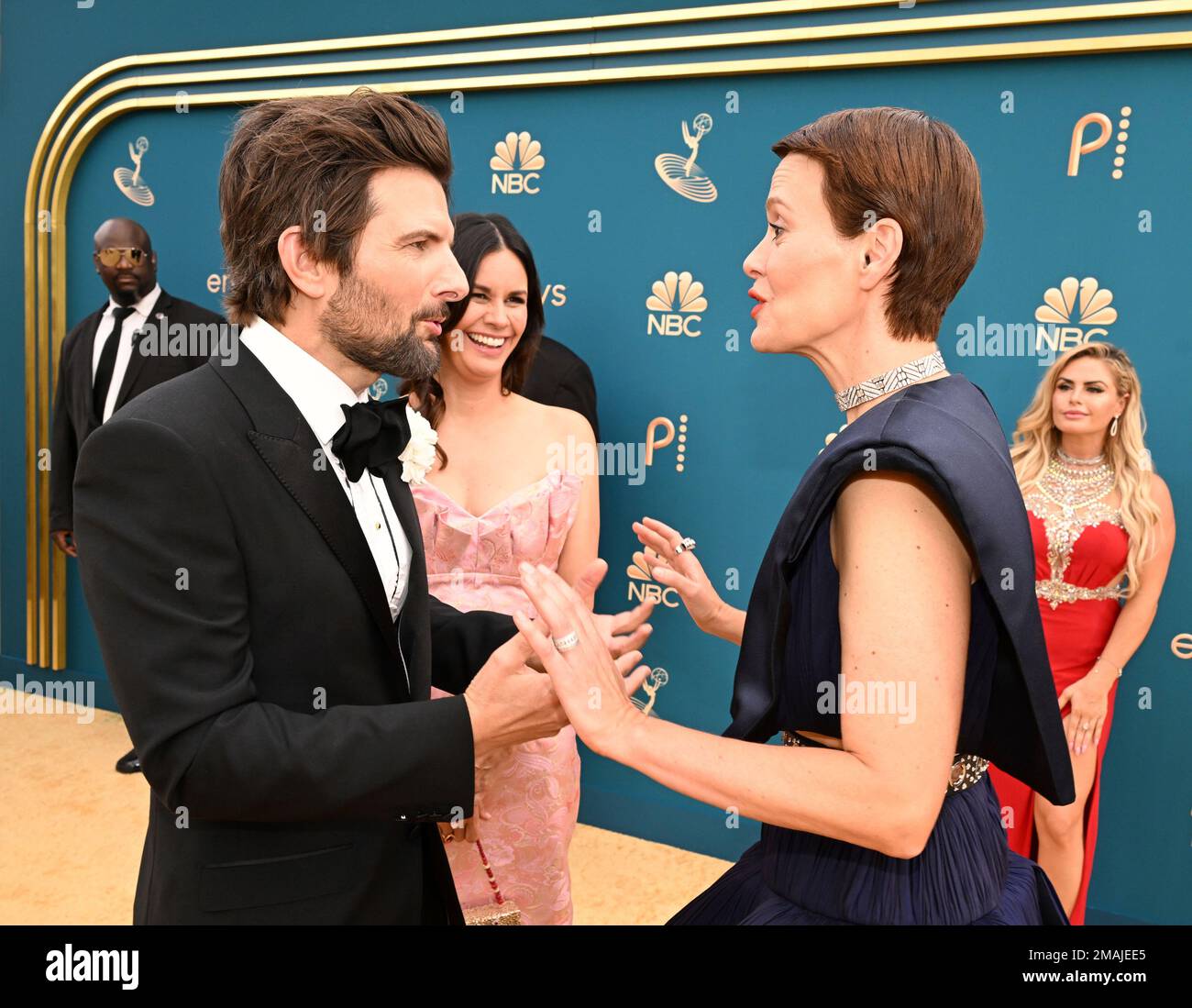 Adam Scott, left, and Sarah Paulson arrives at the 74th Emmy Awards on ...