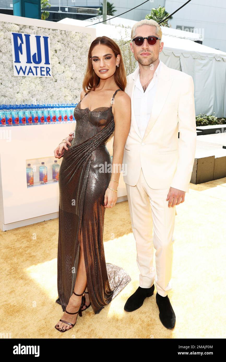 Lily James, left, and Michael Shuman arrive at the 74th Emmy Awards on ...