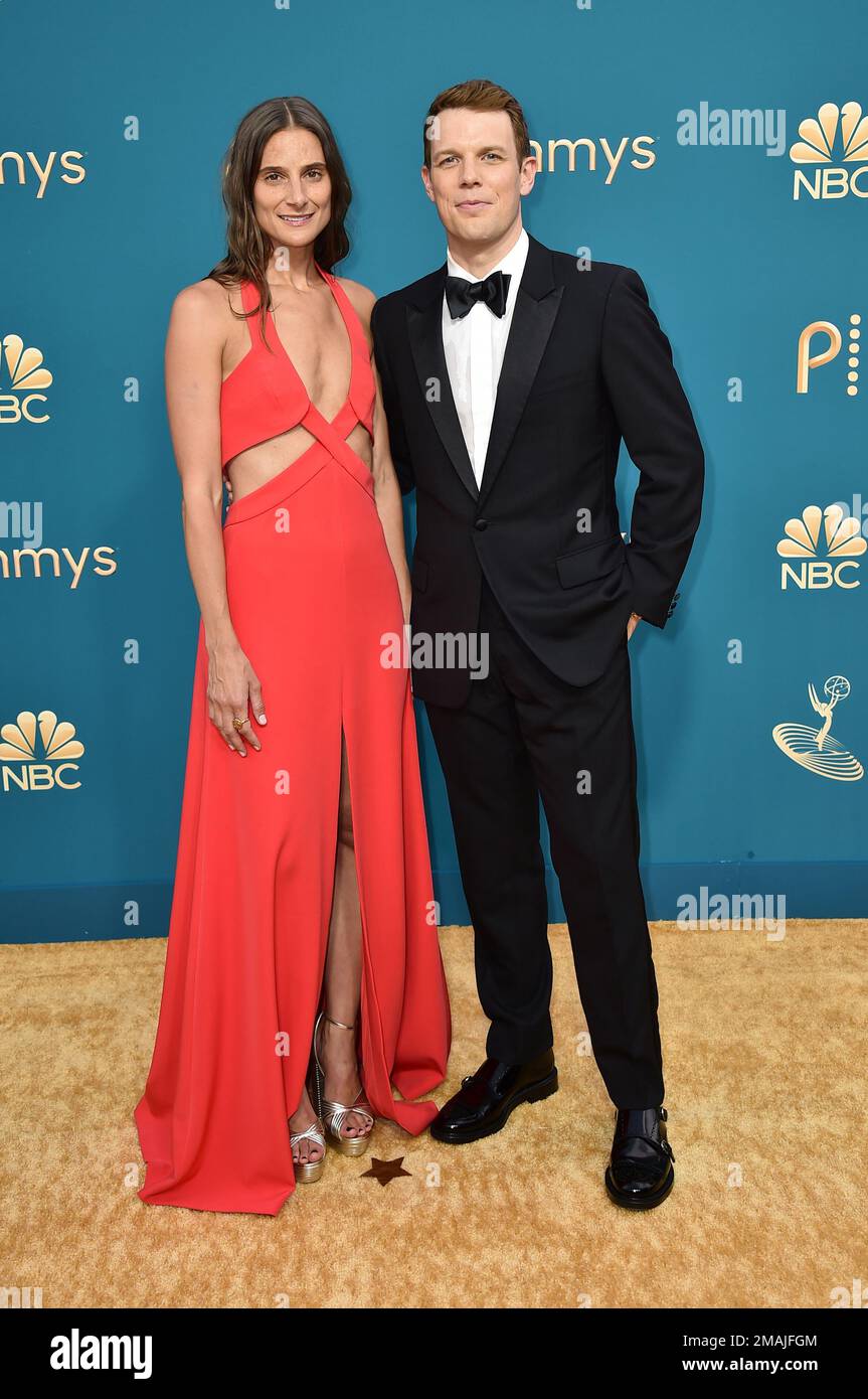 Jake Lacy, right, and Lauren Lacy arrive at the 74th Emmy Awards on ...