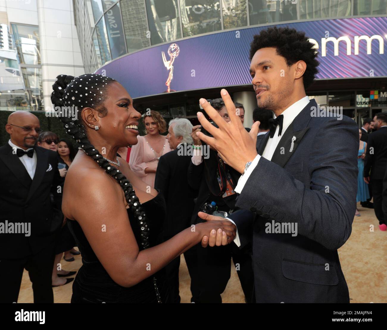 Sheryl Lee Ralph, left, and Trevor Noah arrive at the 74th Emmy Awards ...