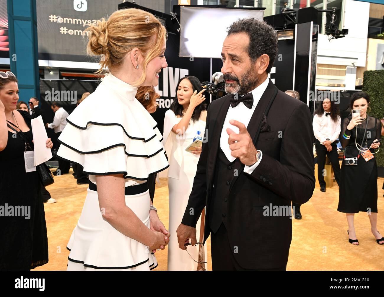 Laura Linney, left, and Tony Shalhoub arrives at the 74th Emmy Awards ...