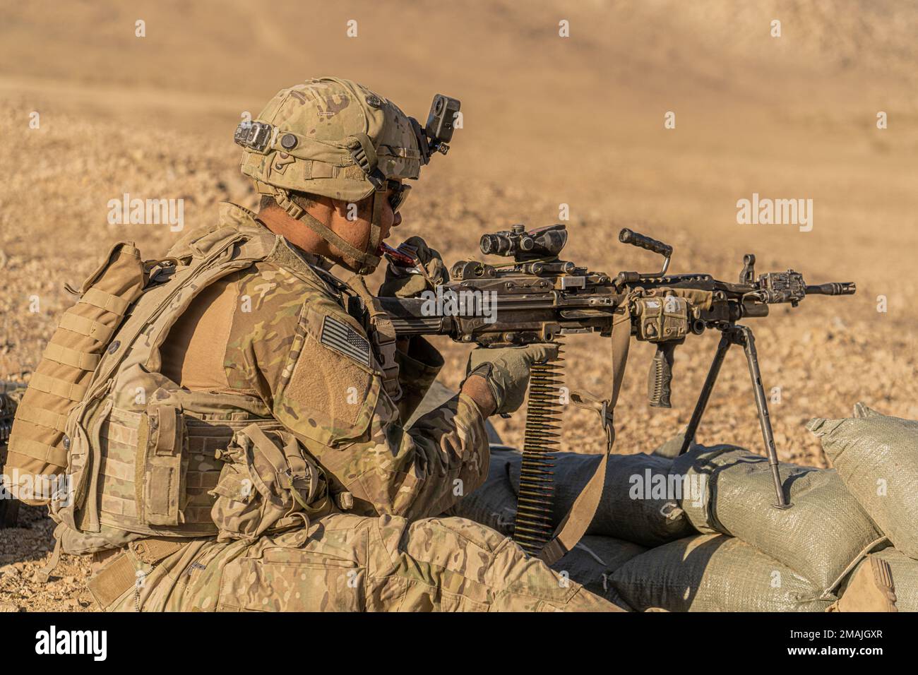 U.S. Army Trooper Pfc. Jack Kirk, a Squad Automatic Weapon gunner ...