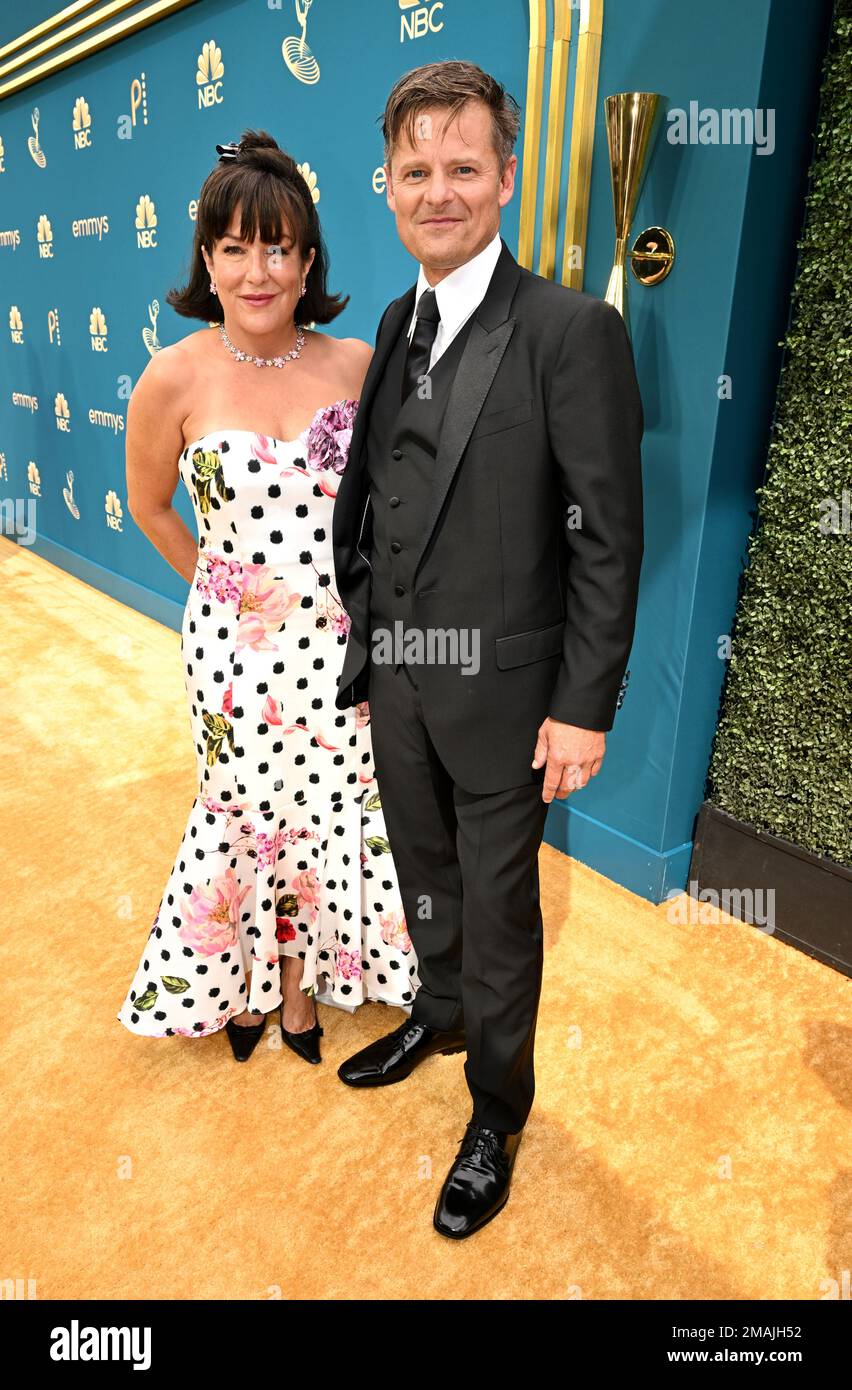 Robyn Peterman, left, and Steve Zahn arrives at the 74th Emmy Awards on ...