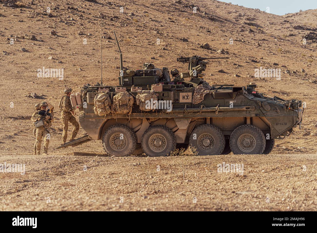 U.S. Army Trooper Spc. Justine Saddi, an assistant gunner assigned to ...