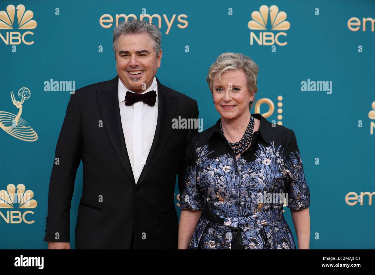 Chris Knight, left, and Eve Plumb arrive at the 74th Emmy Awards on ...