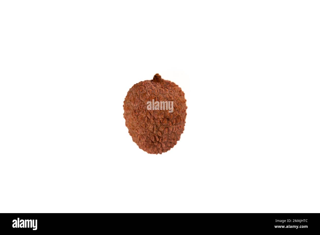 Single lychee on a white background Stock Photo - Alamy