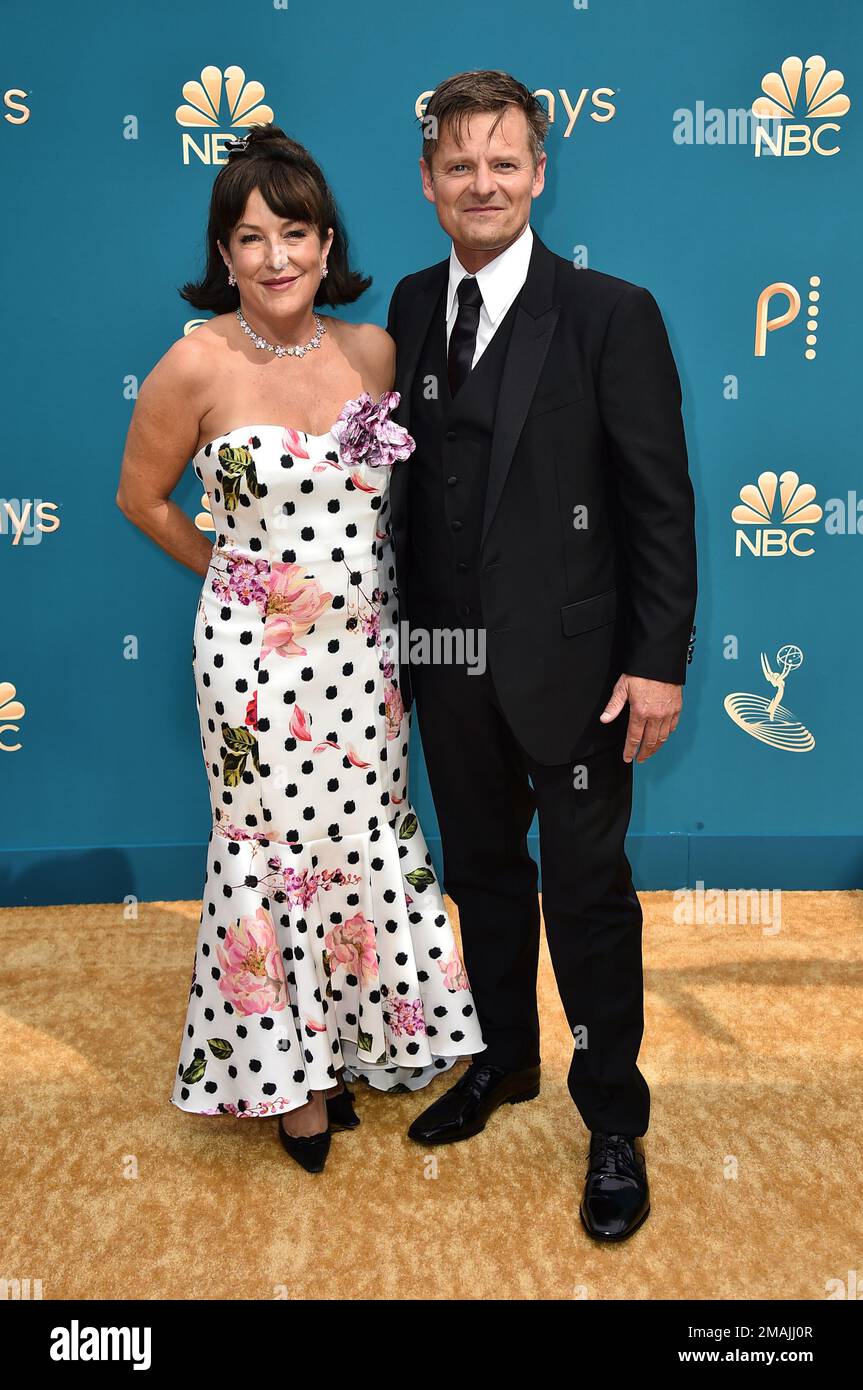 Robyn Zhan, left, and Steve Zahn arrive at the 74th Emmy Awards on ...