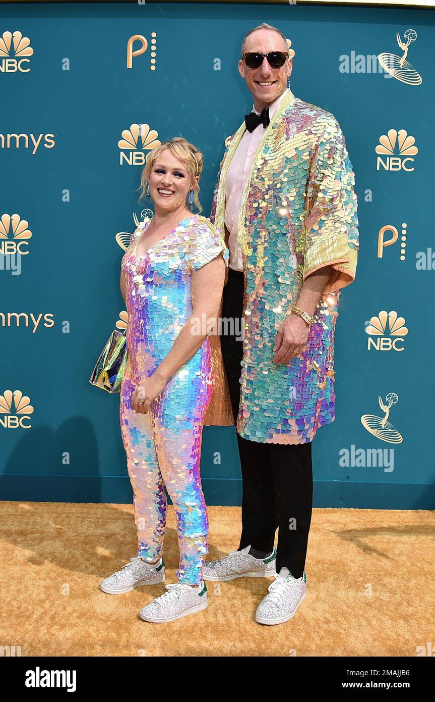 Ariel Dumas, left, and Andrew Ecker arrive at the 74th Emmy Awards on ...