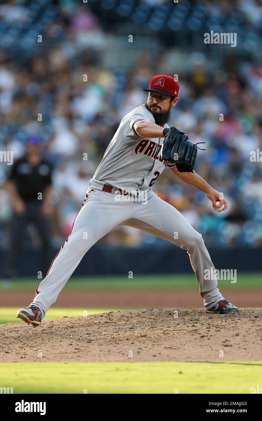 Arizona Diamondbacks relief pitcher Caleb Smith throws to the plate ...