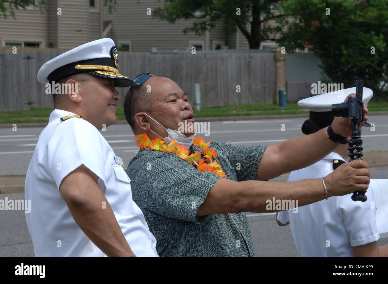 RADM Alan Reyes, Deputy Commander, Naval Supply Systems Command, stops ...