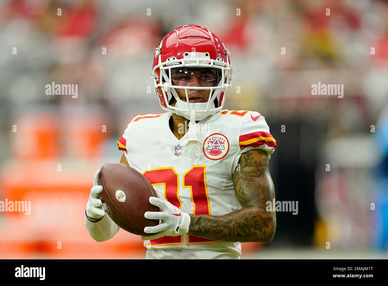 Kansas City Chiefs cornerback Trent McDuffie (21) warms up prior to an ...