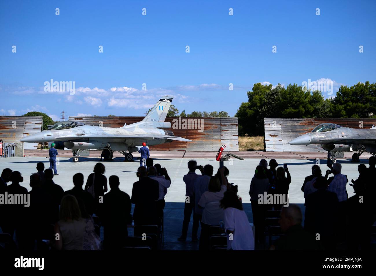 Guests take photographs of the two Greek Fighter Jets F-16 Viper at ...