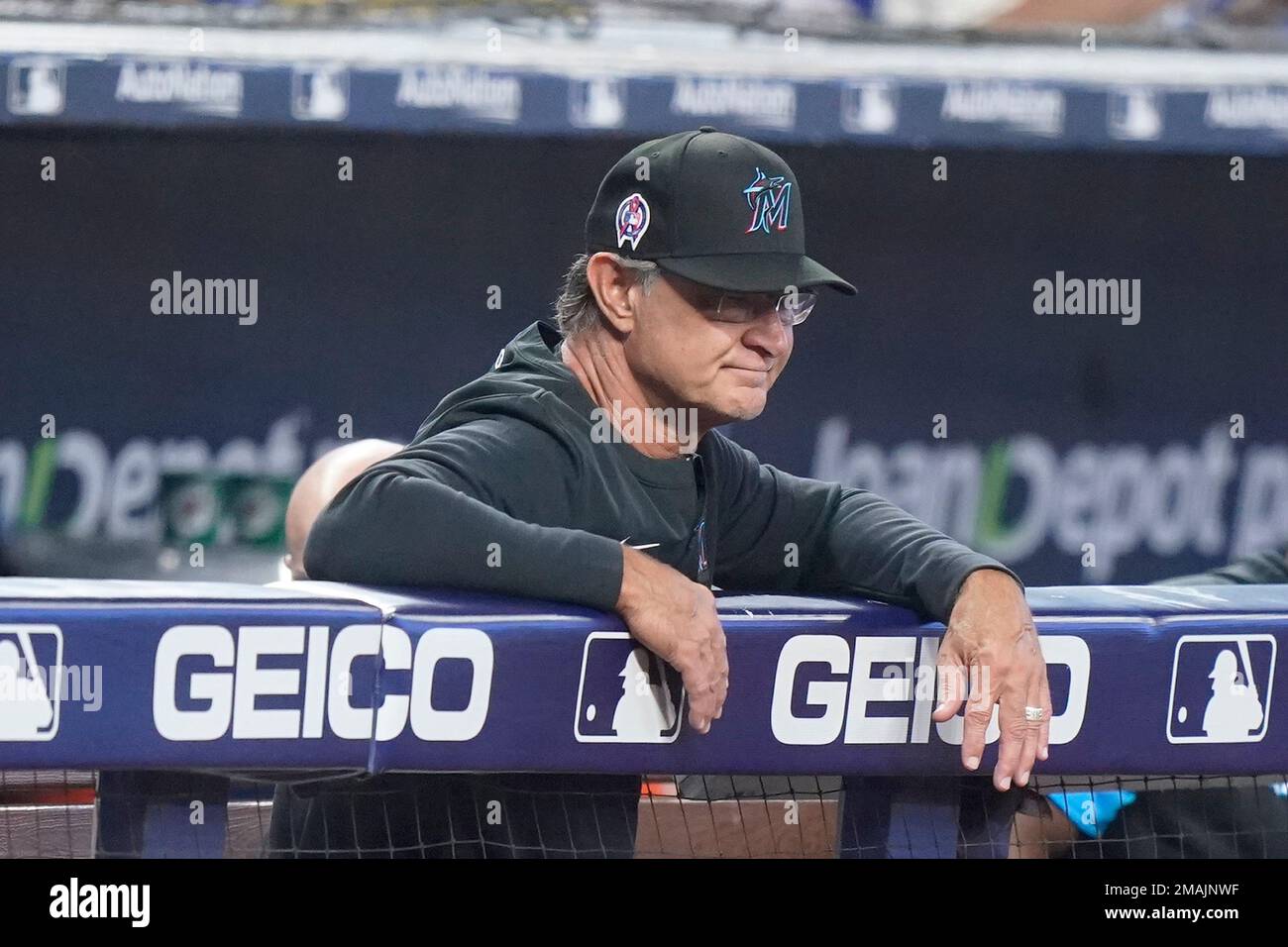 Miami Marlins manager Don Mattingly looks on from the dugout during the ...