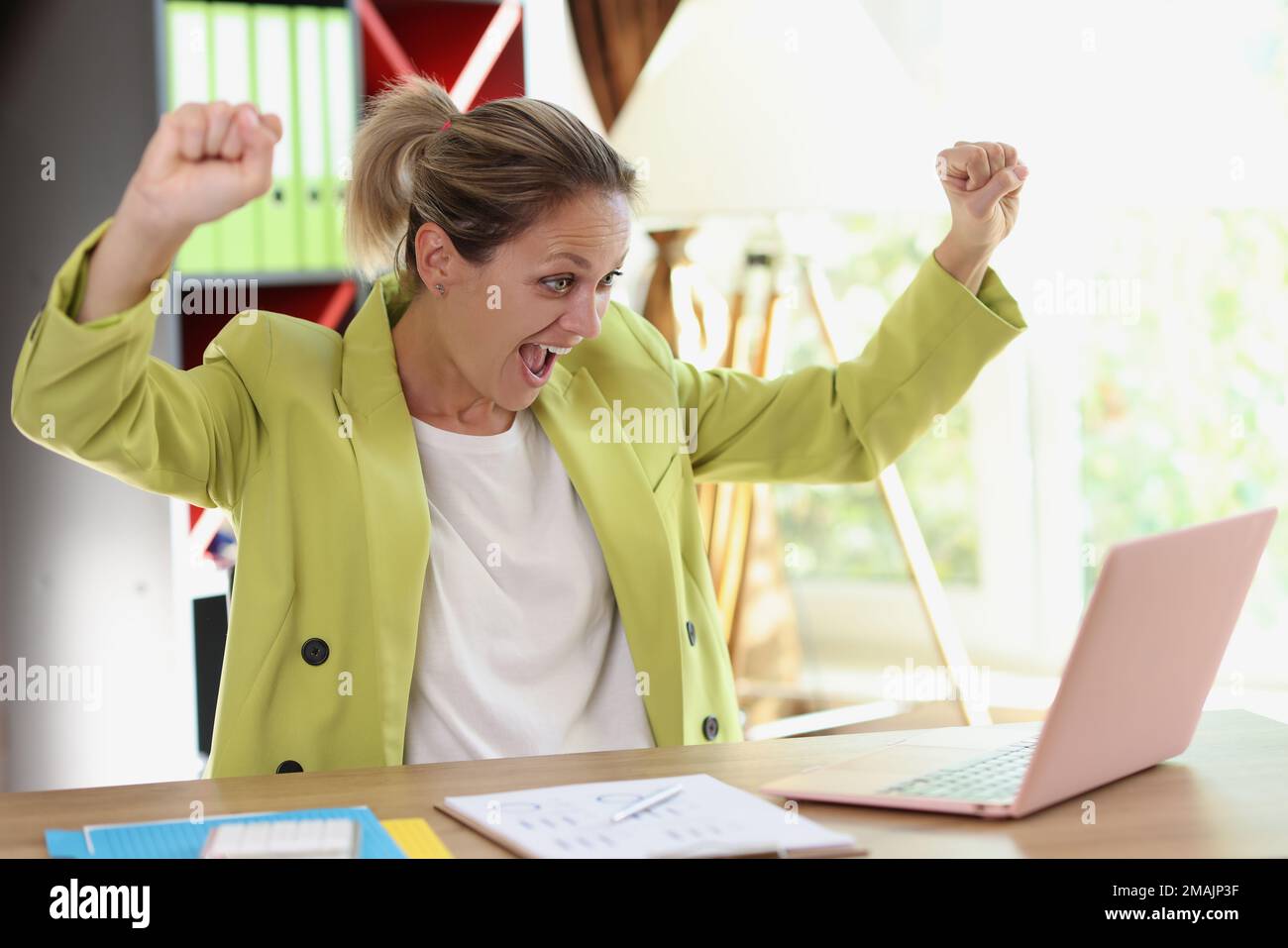 Happy excited business woman hi-res stock photography and images - Alamy