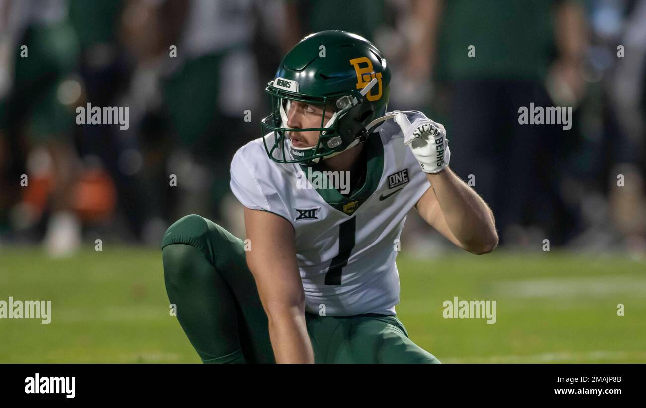 Baylor punter Issac Power (1) awaits the snap to place the football ...